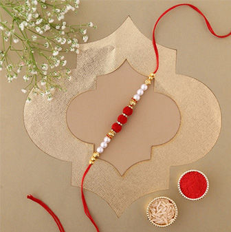 Send Rakhi to USA | Online Rakhi Gifts Delivery in USA, Free Shipping - FNP