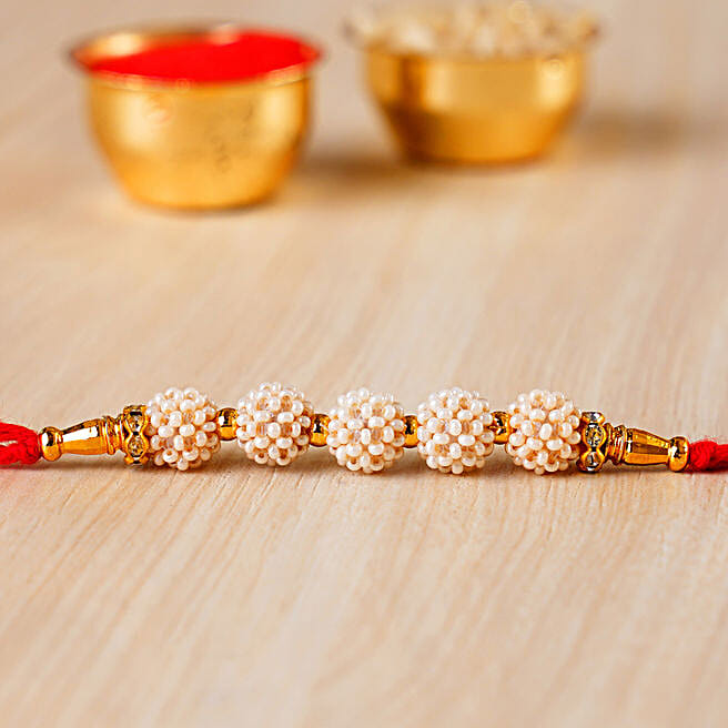 Fancy Golden Pearl Rakhi argentina | Gift Fancy Golden Pearl Rakhi- FNP