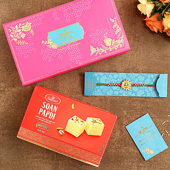 Peacock Feather Bansuri Rakhi And Soan Papdi australia | Gift Peacock ...