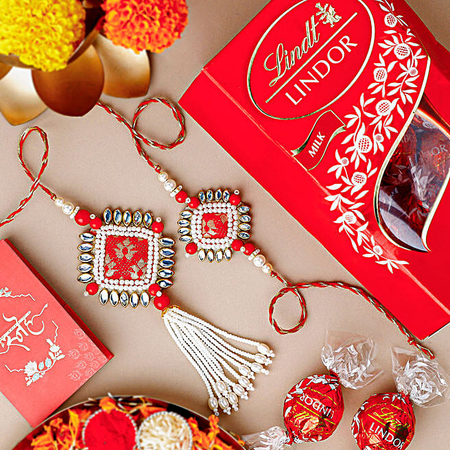 Bandhani Bhaiya-Bhabhi Rakhi Set & Lindt Chocolate Balls Gift Set ...