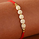 Fancy Golden Pearl Rakhi egypt | Gift Fancy Golden Pearl Rakhi- FNP