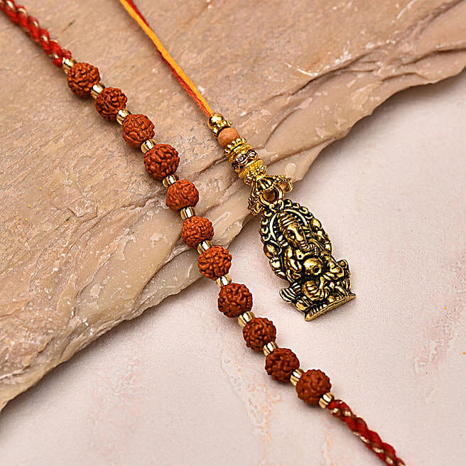 Metallic Ganesha And Rudraksha Rakhi japan | Gift Metallic Ganesha And ...