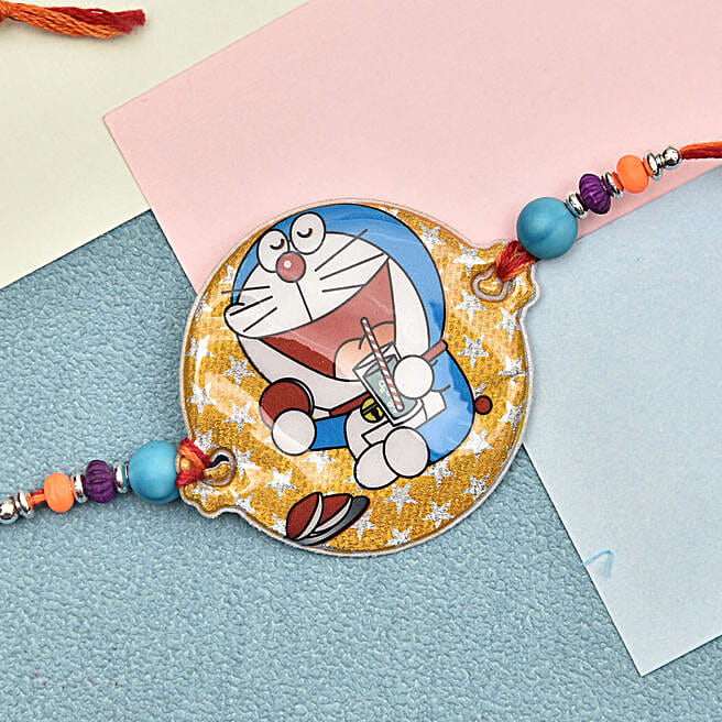 Sweet Doraemon Kids Rakhi korea | Gift Sweet Doraemon Kids Rakhi- FNP