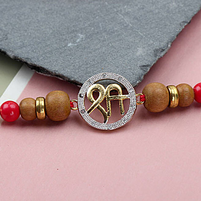 Buy/Send Divine Shri Chandan Rakhi Online- FNP