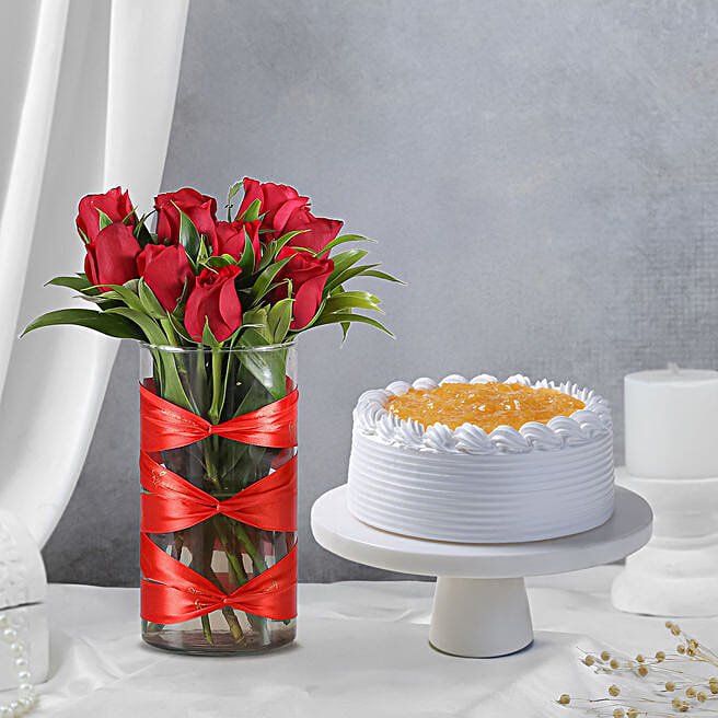 Buy/Send Red Roses Vase with Pineapple Cake Combo Online- FNP
