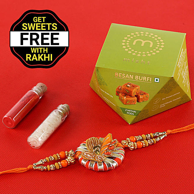 Buy/Send Designer Rakhi With Free Besan Burfi Box Online- FNP