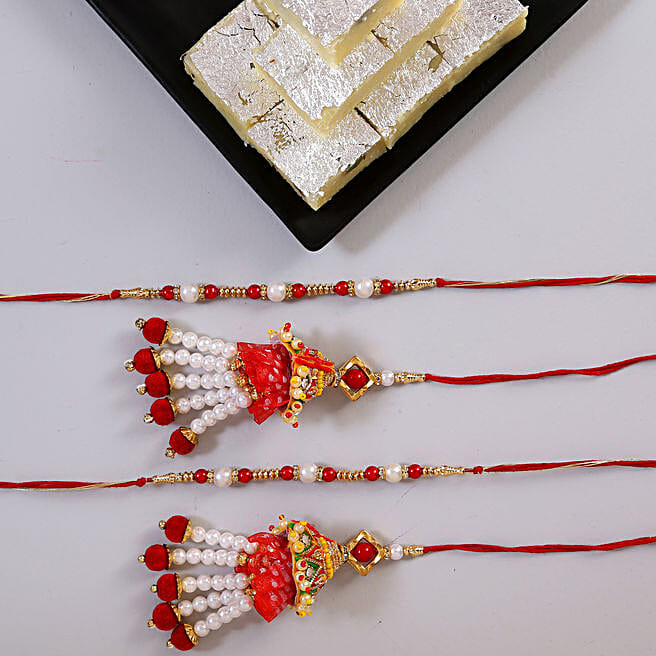 Buy/Send Set Of Designer Rakhis & Pista Burfi Online- FNP