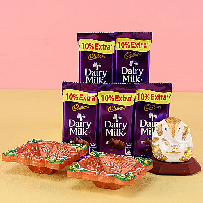 Buy/Send White Ganesha Idol & Dairy Milk Combo Online- FNP