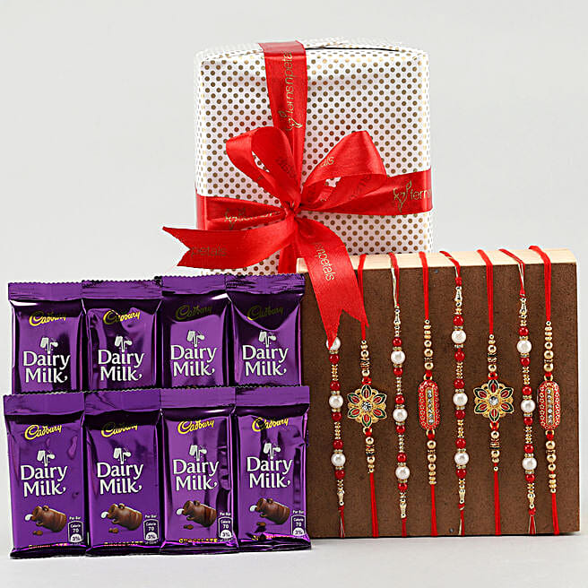 Buy/Send Set of 8 Rakhis & Dairy Milk Gift Pack Online- FNP