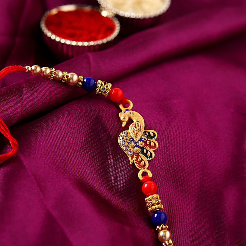 Buysend Beautiful Designer Peacock Rakhi Online Fnp