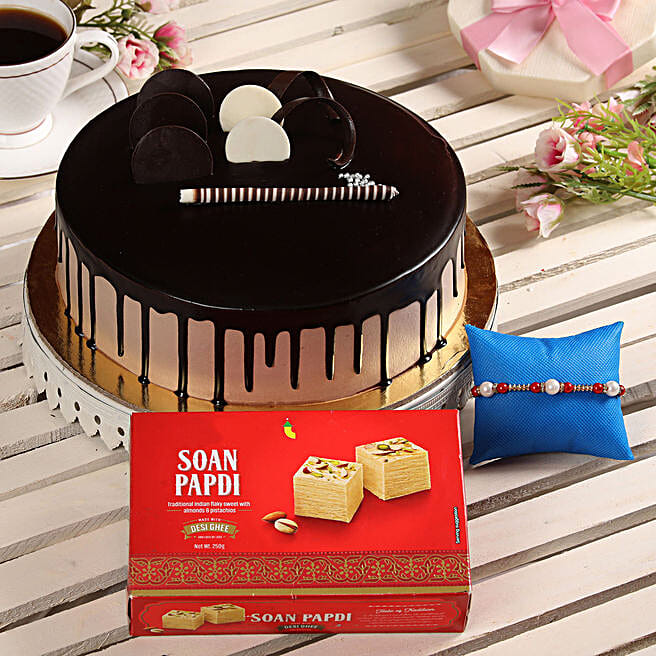 Buy/Send Chocolate Cake With Rakhi & Sweets Online- FNP