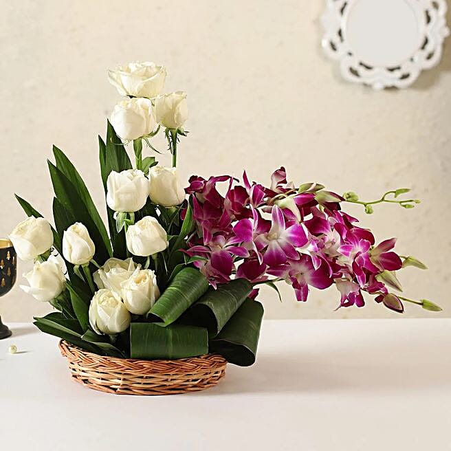 Buy/Send White Roses & Orchids Arrangement Online- Ferns N Petals
