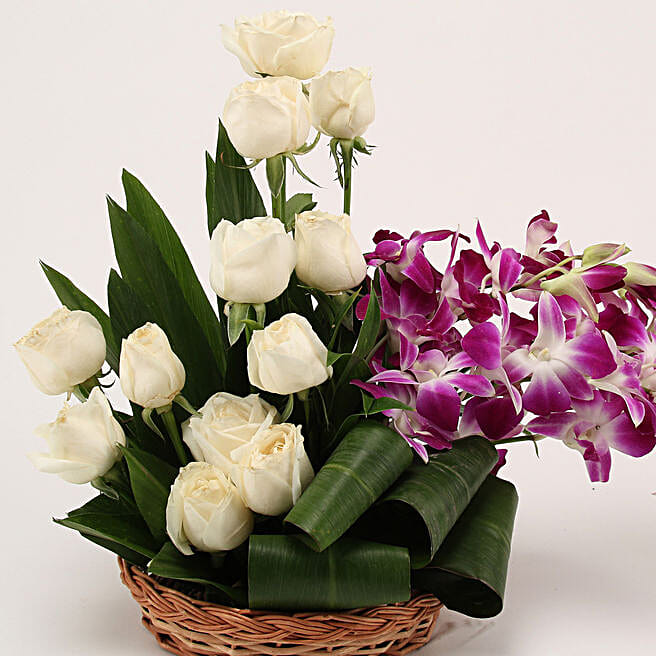 Buy/Send White Roses & Orchids Arrangement Online- Ferns N Petals