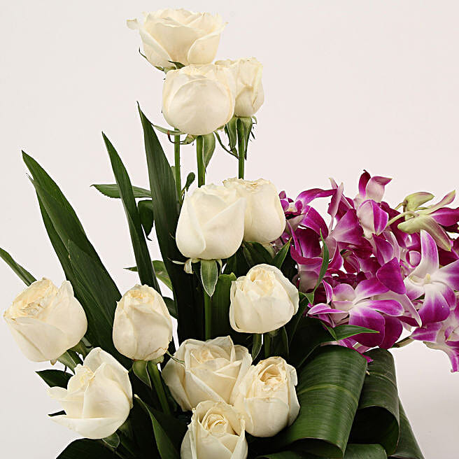 Buy/Send White Roses & Orchids Arrangement Online- Ferns N Petals