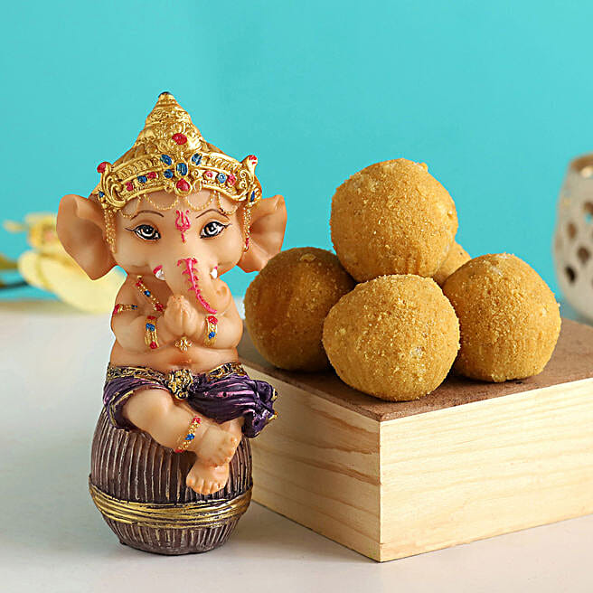 Buy/Send Sitting Bal Ganesha Idol & Besan Laddu Online- FNP