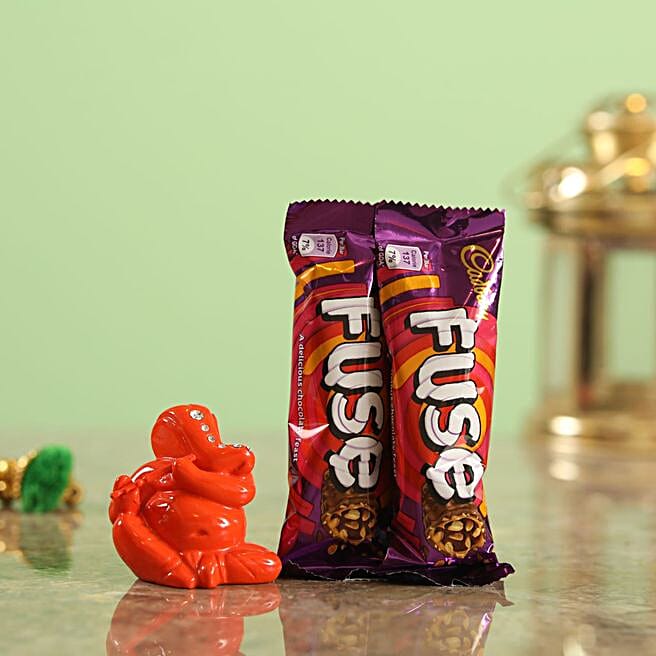 Buy/Send Fuse Chocolate & Orange Ganesha Idol Online- FNP