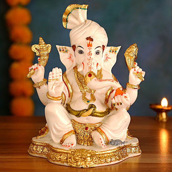 Buy/Send Gorgeous White & Gold Raja Ganesha Idol Online- FNP