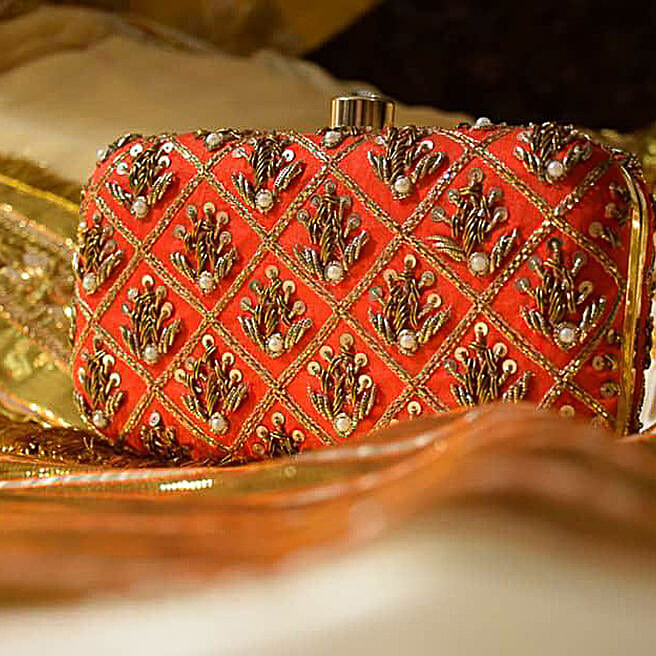 Buy/Send Lovely Orange Clutch Bag Online- FNP