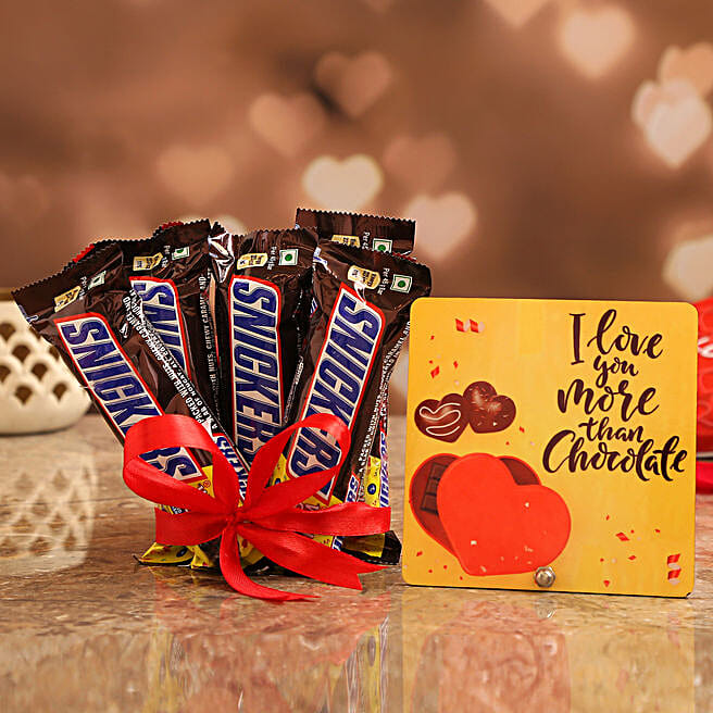 Buy/Send Snickers Chocolates With Table Top and Red FNP Ribbon Online- FNP