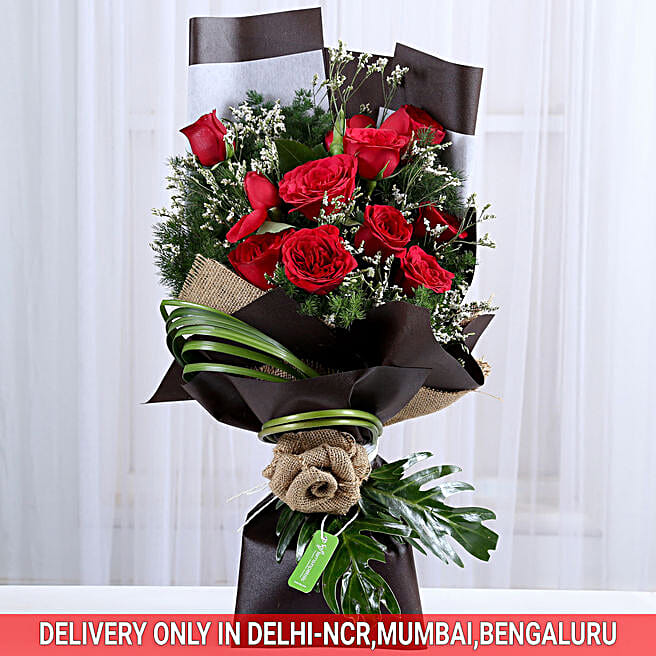Buy/Send Red Roses & White Limoniums Bouquet Online- FNP