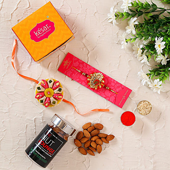Buy/Send Pretty Rakhi and Edible Kesar Mithai Rakhi With Almonds Online ...