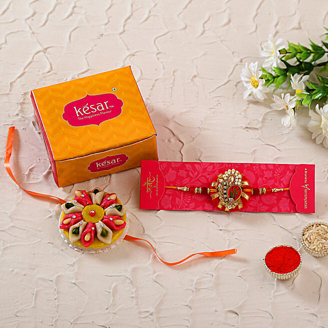 Buy/Send Pretty Stone Rakhi and Edible Kesar Mithai Rakhi Online- FNP