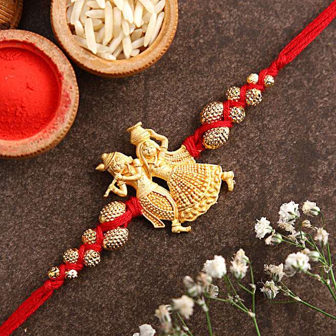 Buy/Send Radha Krishna Design Rakhi Online- FNP