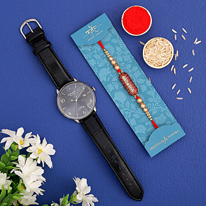 Buy/Send Designer Capsule Rakhi & Omax Analog Watch Online- FNP