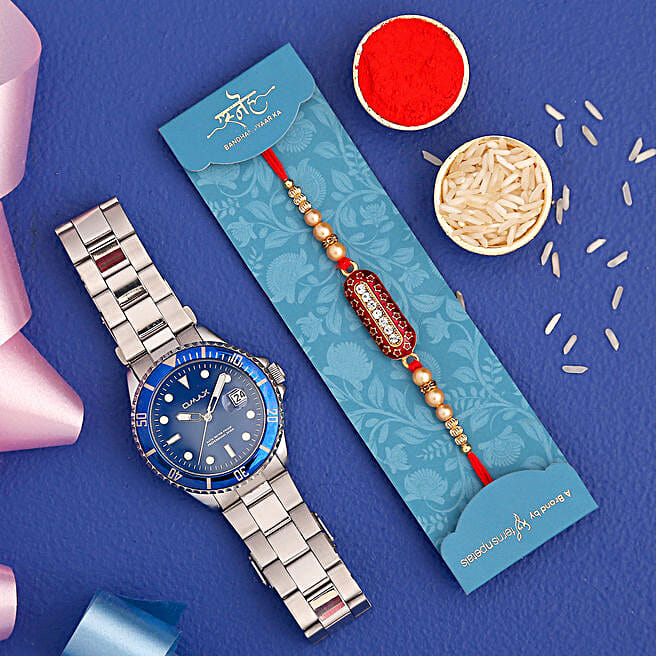 Buy/Send Designer Capsule Rakhi & Omax Elegant Blue Dial Watch Online- FNP