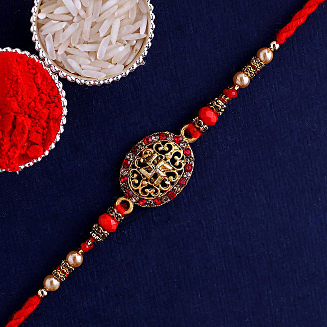Buy/Send Auspicious Swastika Rakhi Online- FNP