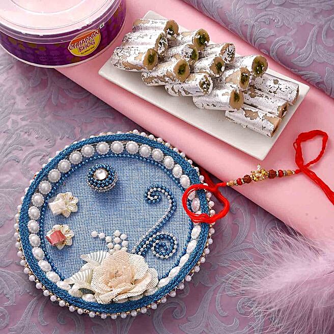 Buy/Send Rudraksha Rakhi With Pooja Thali & Pista Roll Online- FNP