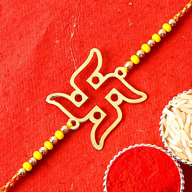 Buy/Send Premium Pious Swastika Metal Rakhi Online- FNP
