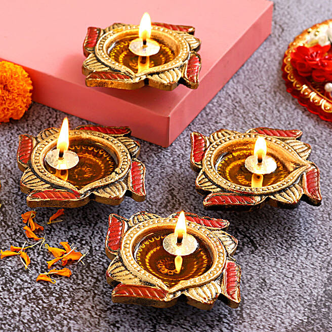 Buy/Send Multicolour Swastika Oil Diyas Online- FNP