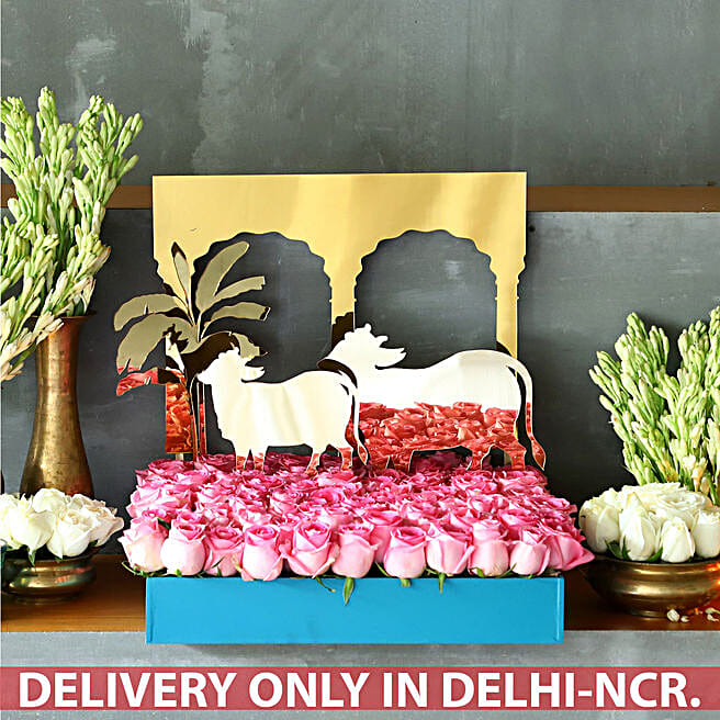 Buy/Send Emma Roses & Divine Nandi Arrangement Online- FNP