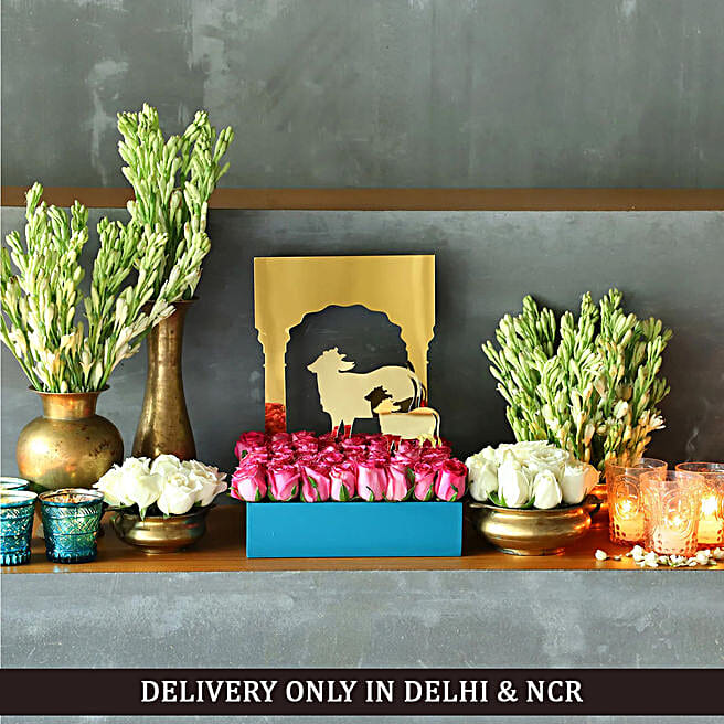 Buy/Send Emma Roses & Holy Nandi Arrangement Online- Ferns N Petals