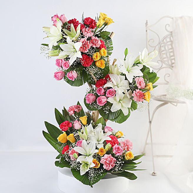 Buy/Send Springtime Symphony Floral Arrangement Online- FNP