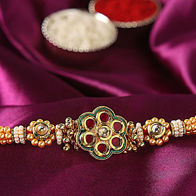 Buy/Send Sneh Aurum Beads Rakhi Online- FNP