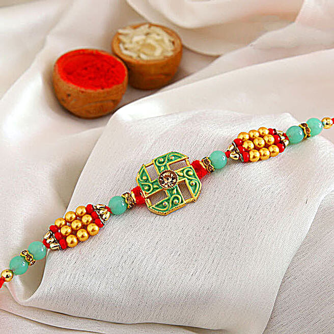 Buy/Send Multicolor Swastika Rakhi Online- FNP