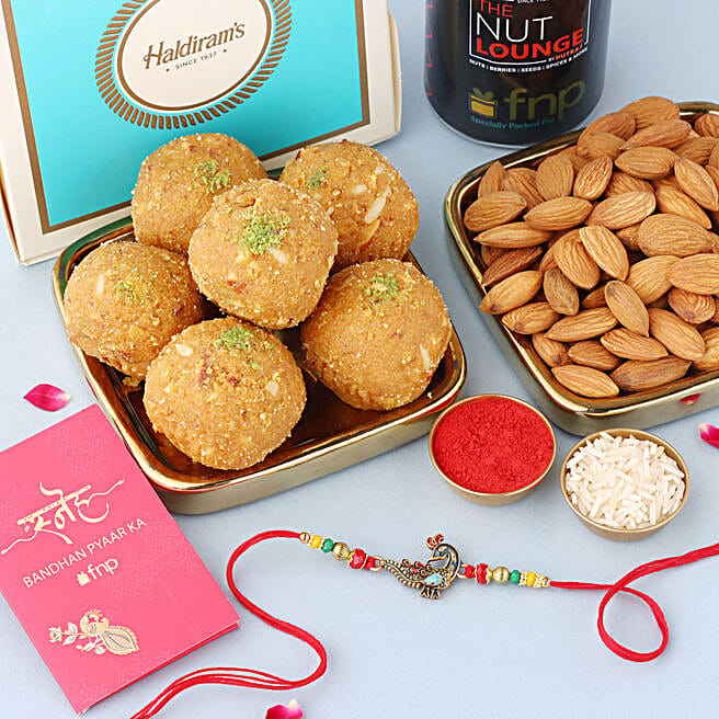 Buy/Send Sneh Meenakari Peacock Rakhi & Sweet Goodies Online- FNP