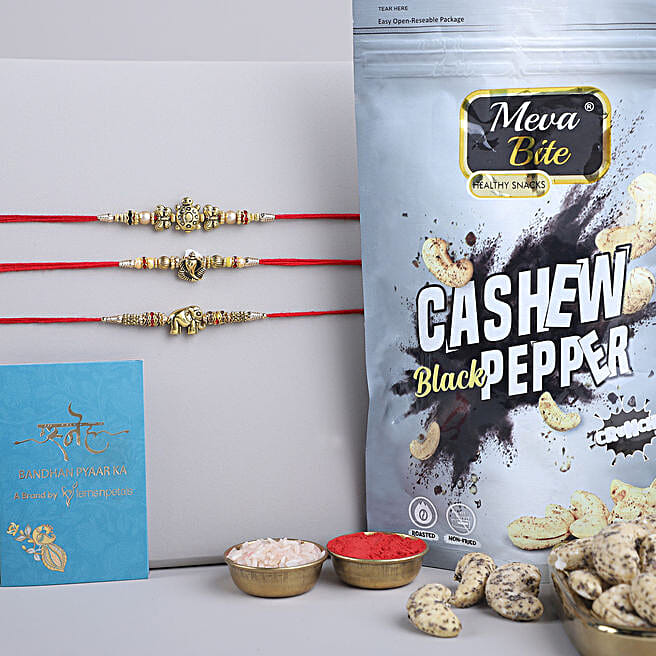 Buy/Send Sneh Ganesha Rakhi Set with Healthy Snacks Online- FNP