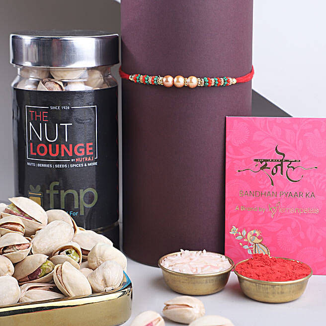 Buy/Send Sneh Pearl Rakhi with Pista Jar Online- FNP