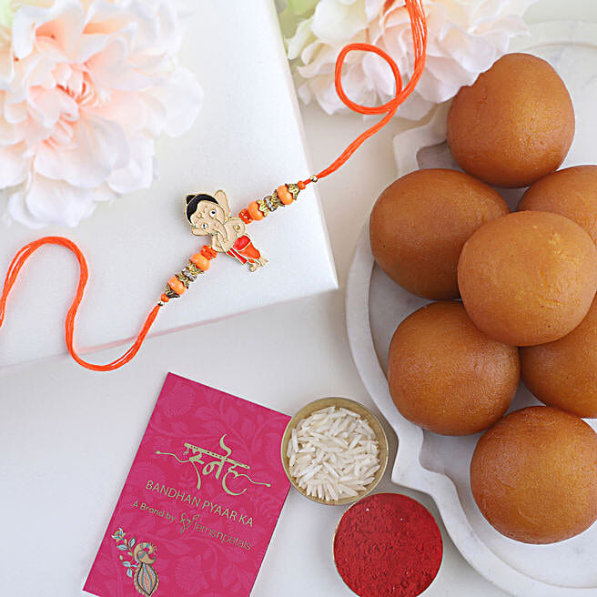Buy/Send Sneh Bal Ganesha Kids Rakhi with Gulab Jamun Online- FNP