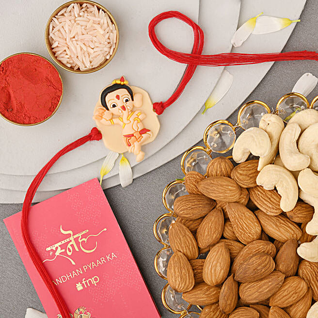 Buy/Send Bal Ganesha Rakhi & Dry Fruit Combo Online- FNP