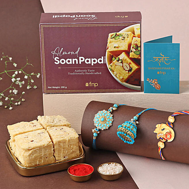 Buy/Send Sneh Ethnic Family Rakhi Set & Soan Papdi Box Online- FNP