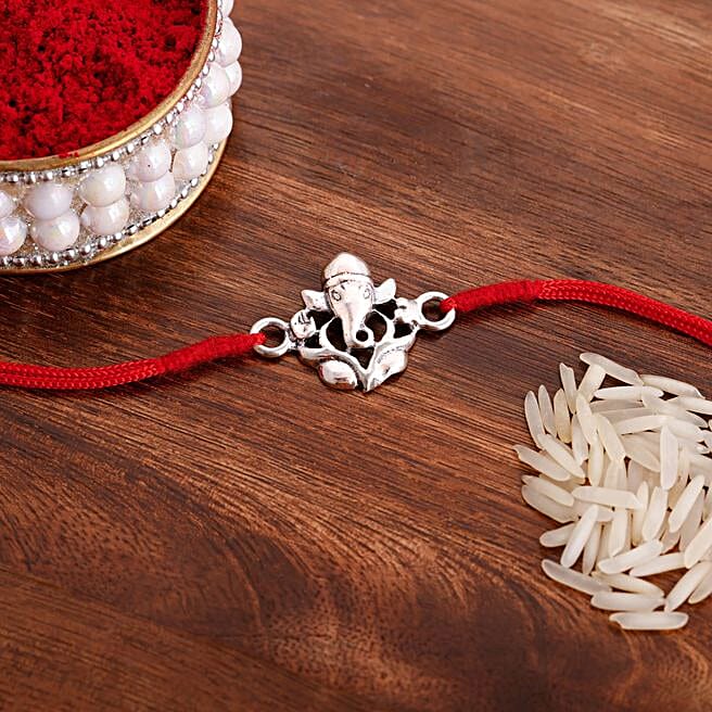 Buy/Send Divine Ganesha 925 Silver Rakhi Online- FNP
