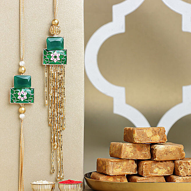 Buy/Send Blossom Rajasthani Bhaiya-Bhabhi Rakhi Set with Channa Barfi Combo Online- FNP