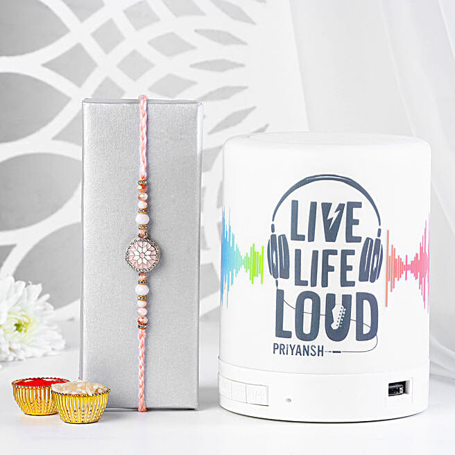 Buy/Send Rosy Floral Charm Rakhi & Personalised LED Speaker Online- FNP