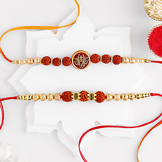 Buy/Send Sacred Blessings Ganesha Mukh and Rudraksh Rakhi Set of 2 ...