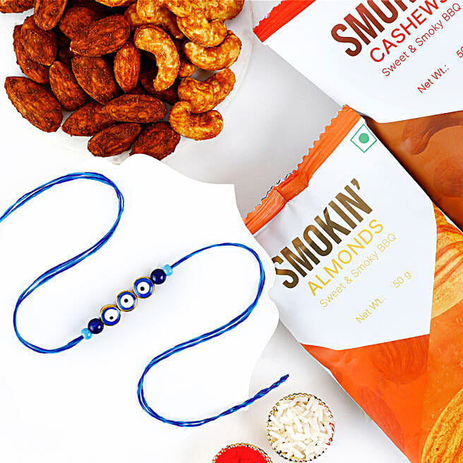 Buy/Send Simplistic Blue Evil Eye Rakhi & Nuts Combo Online- FNP