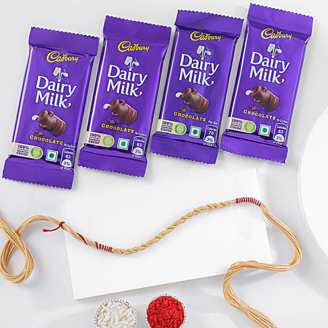 Buy/Send Intertwined Minimalist Dora Rakhi & Dairy Milk Chocolate Gift ...
